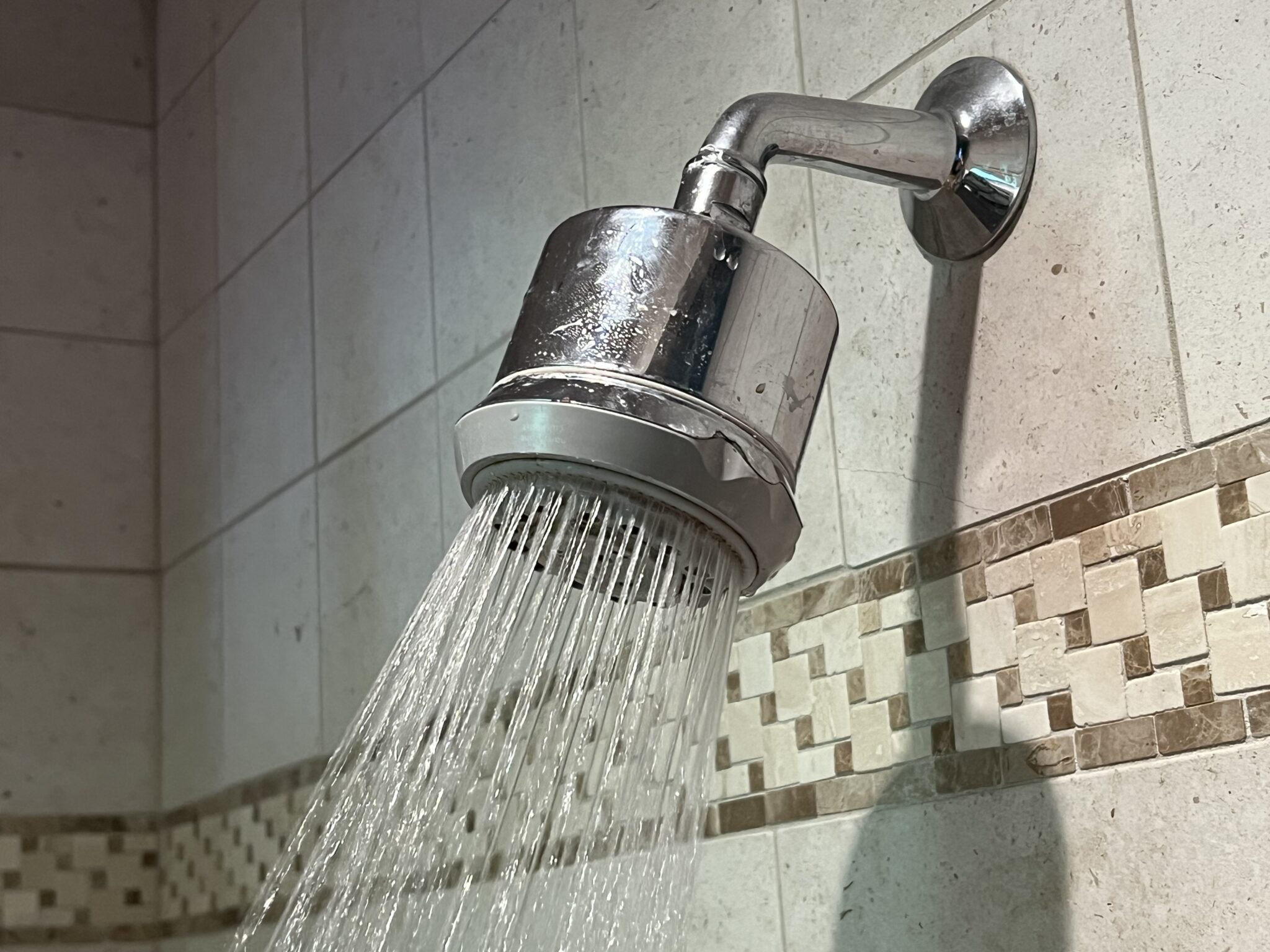 How to Clean a Clogged Shower Head | HomeTips
